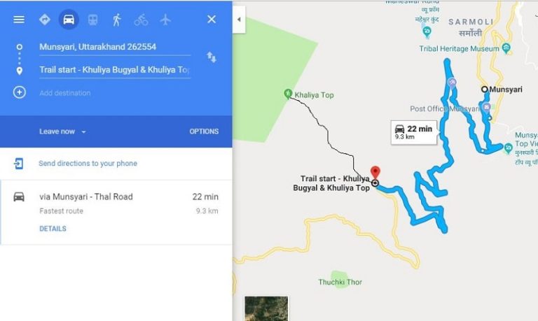 Hoisting the Indian flag at Zero Point on Khaliya top trek - Munsiyari